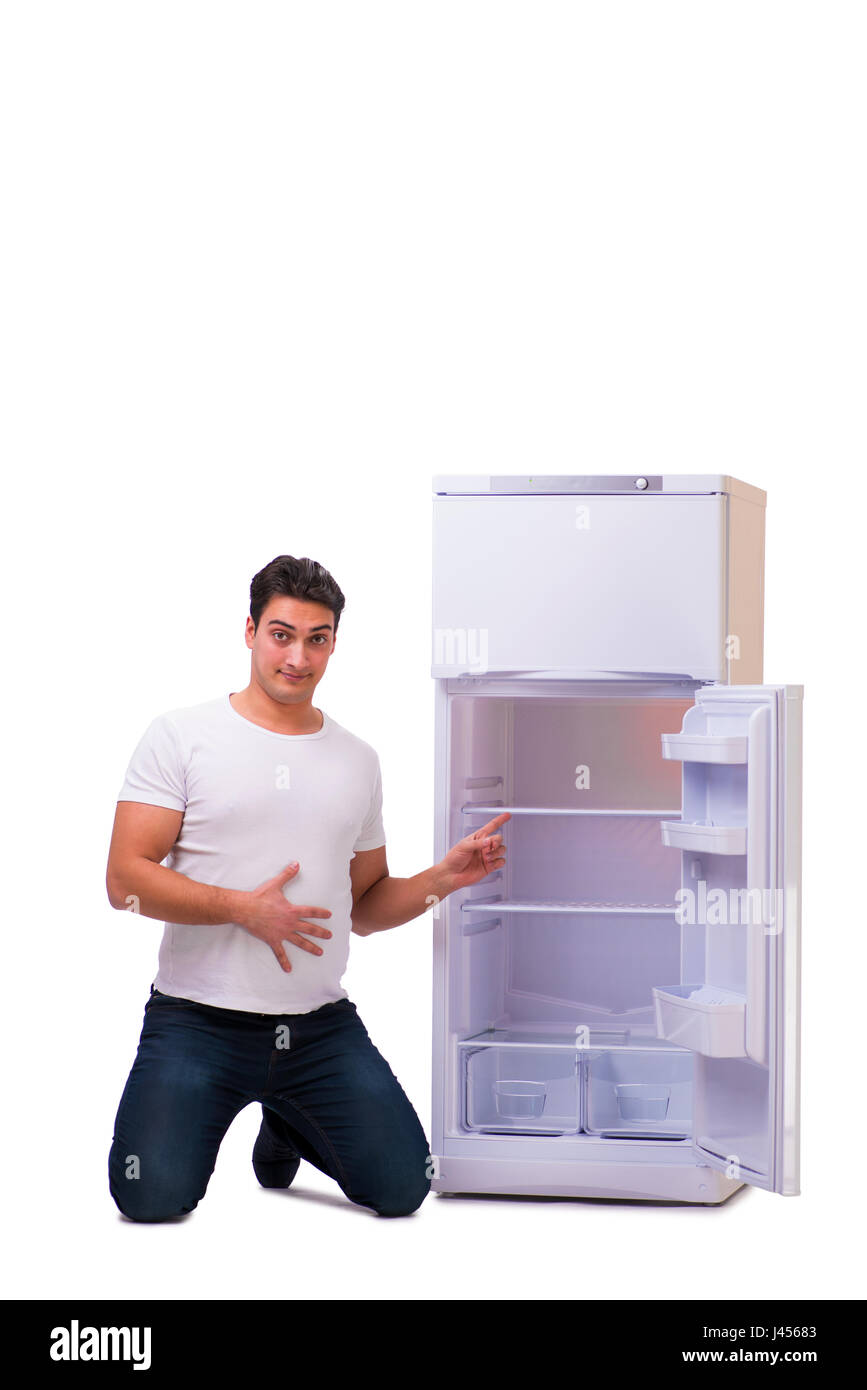 Man looking for food in empty fridge Stock Photo - Alamy