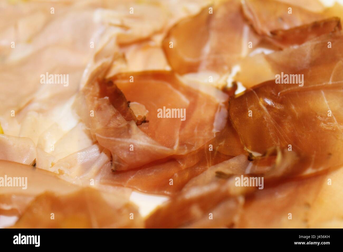 Slices of Italian ham on the plate Stock Photo - Alamy