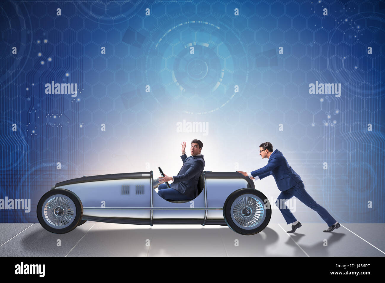 Businessman car pushing in teamwork concept Stock Photo - Alamy