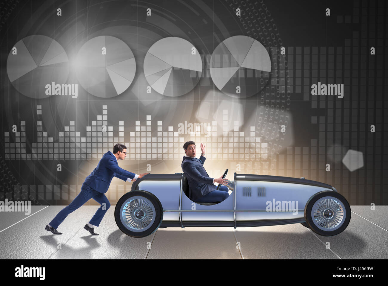 Businessman car pushing in teamwork concept Stock Photo - Alamy