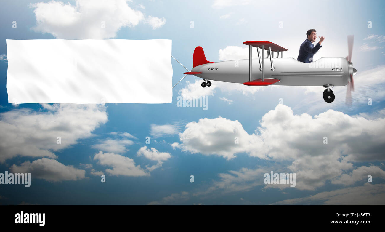 Biplane with businessman and blank banner Stock Photo - Alamy