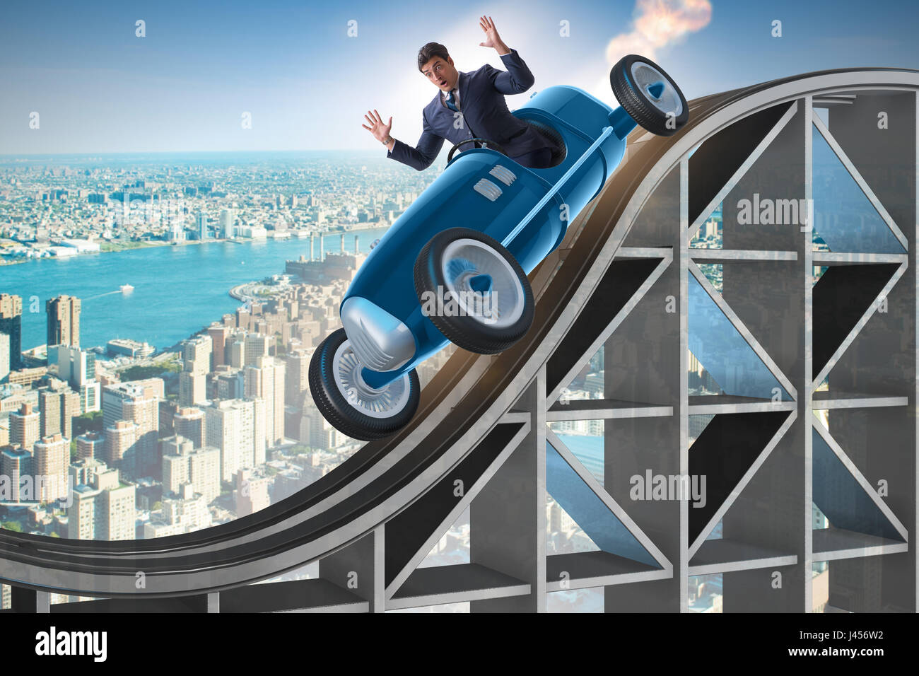Businessman driving sports car on roller coaster Stock Photo - Alamy