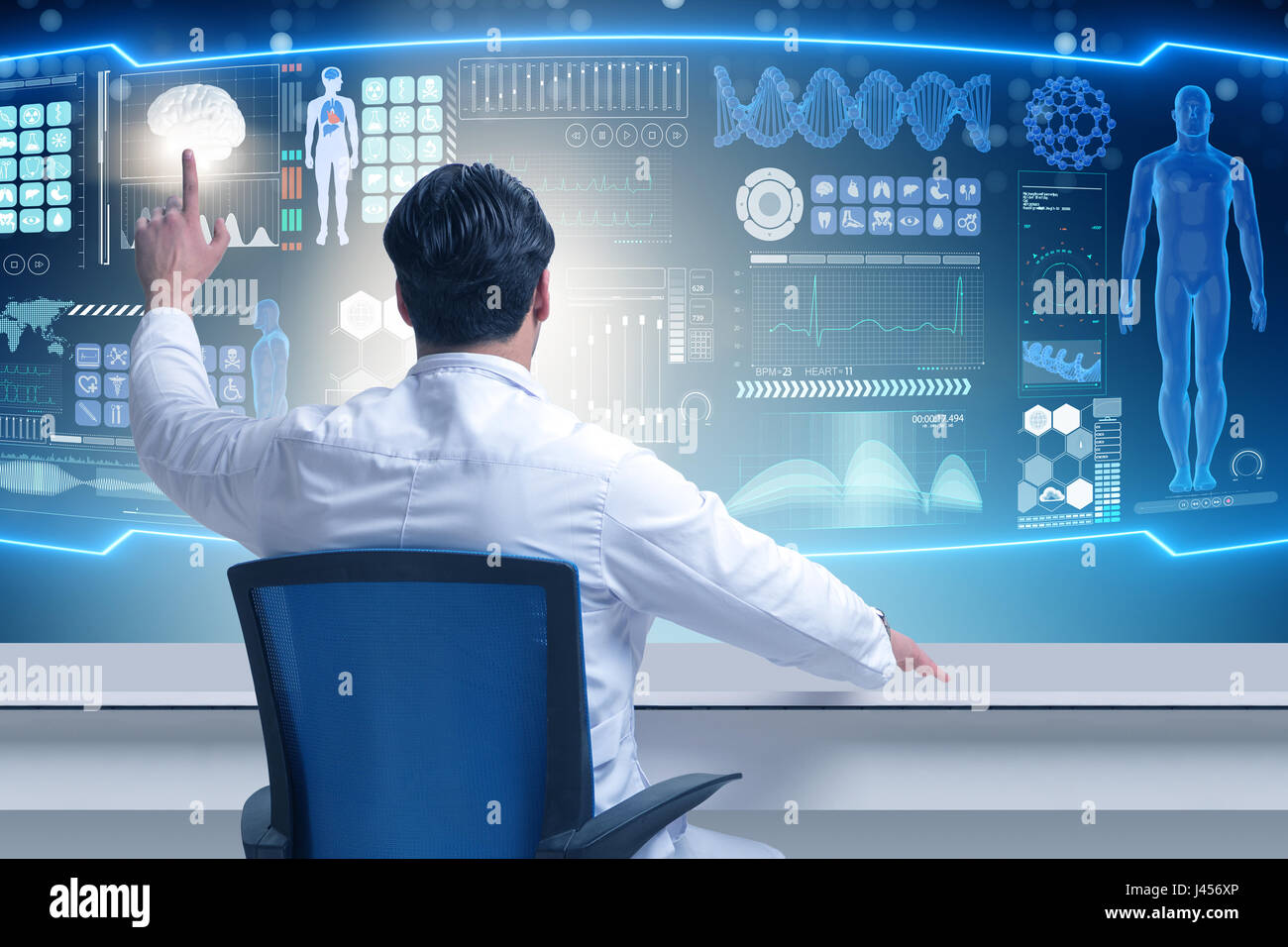 Male doctor in futuristic medical concept Stock Photo - Alamy