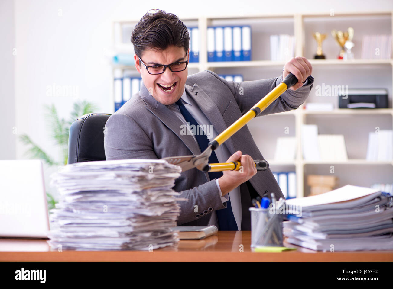 Angry aggressive businessman in the office Stock Photo - Alamy