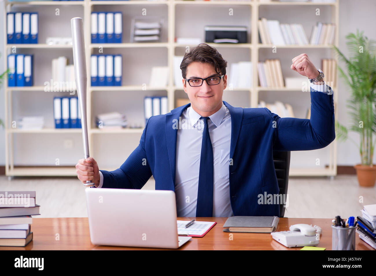 Angry aggressive businessman in the office Stock Photo - Alamy