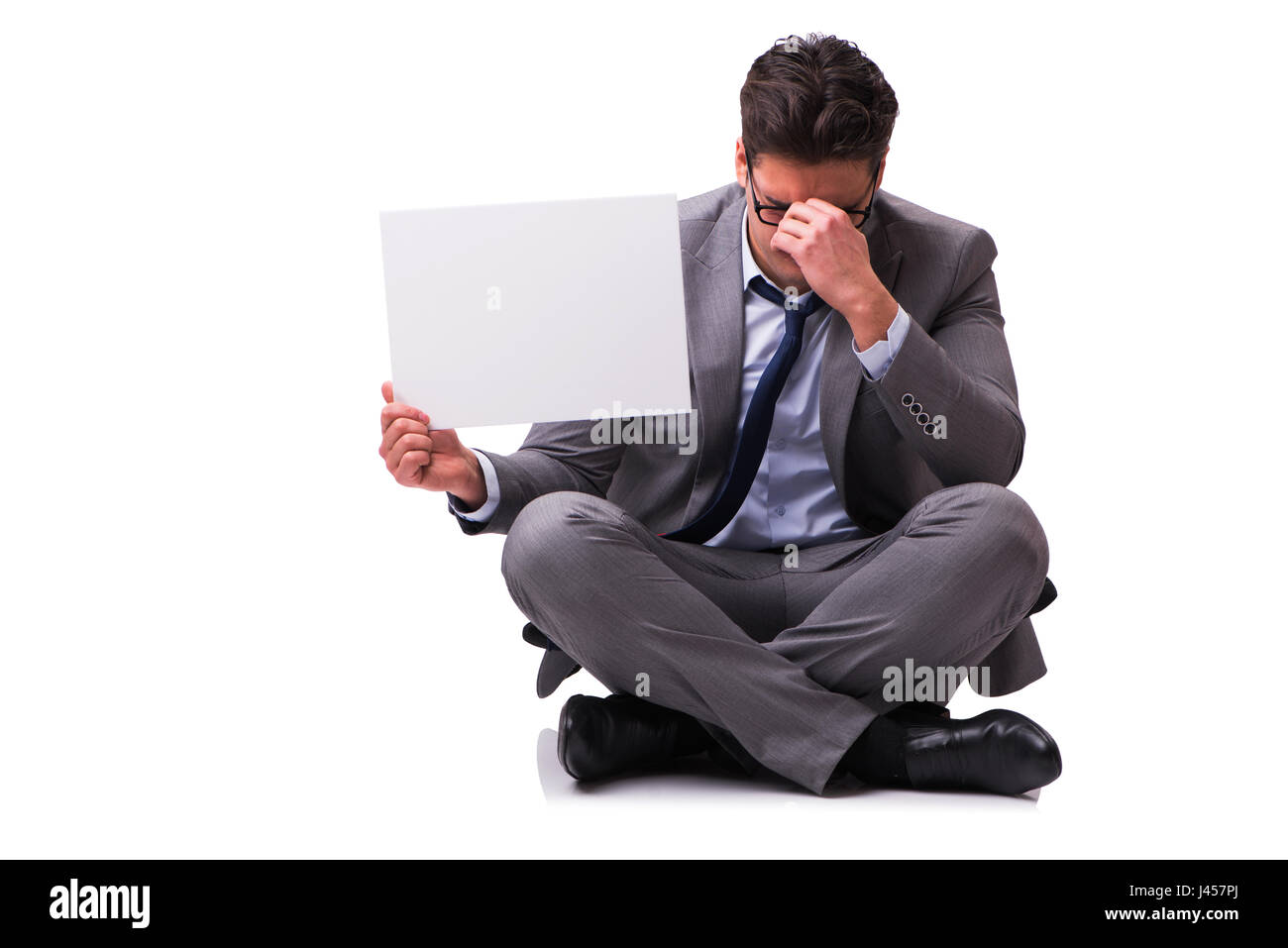 Bankrupt businessman isolated on white background Stock Photo - Alamy
