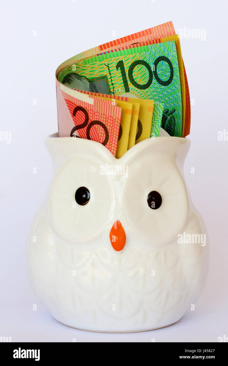 Australian dollars in an owl Stock Photo - Alamy