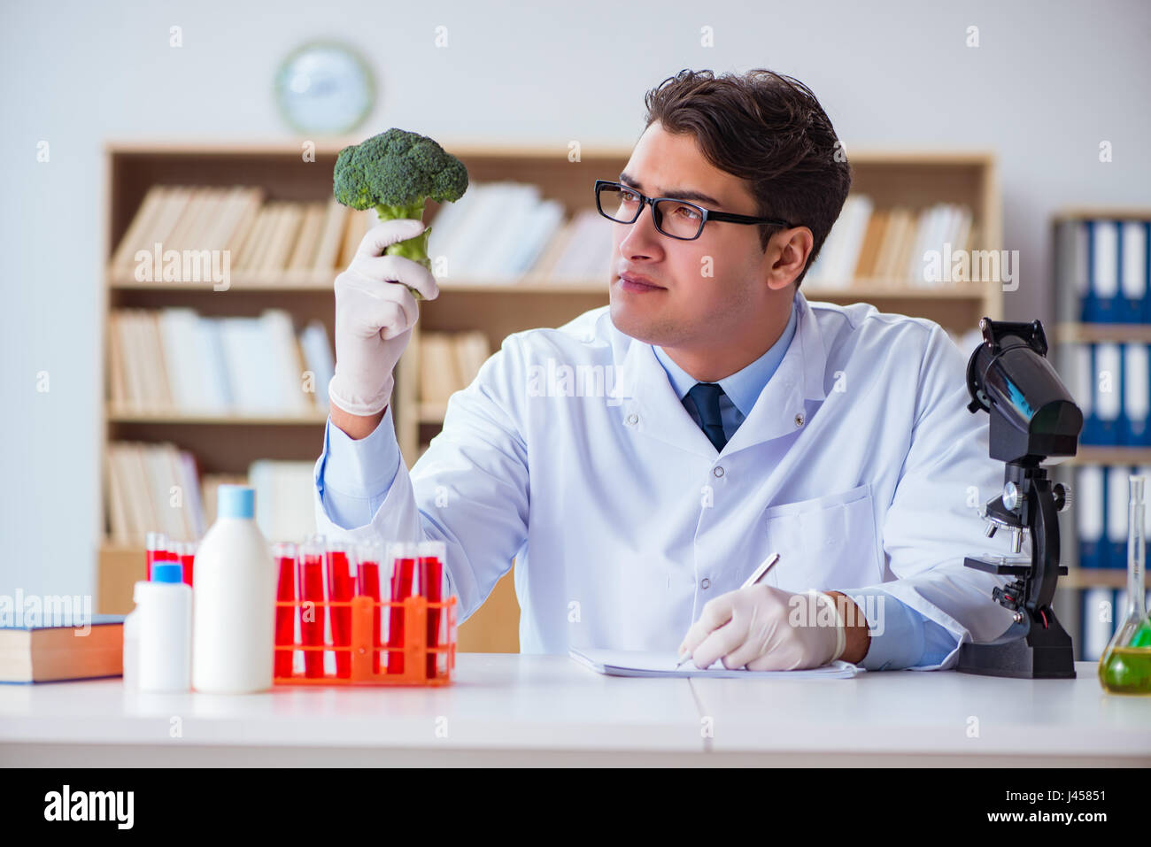 Scientist working on organic fruits and vegetables Stock Photo - Alamy