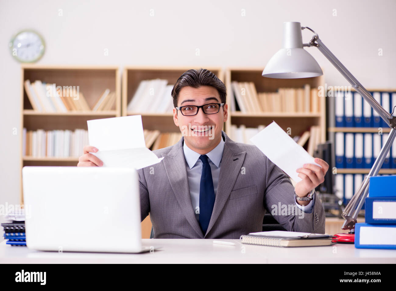 Businessman receiving letter in the office Stock Photo - Alamy