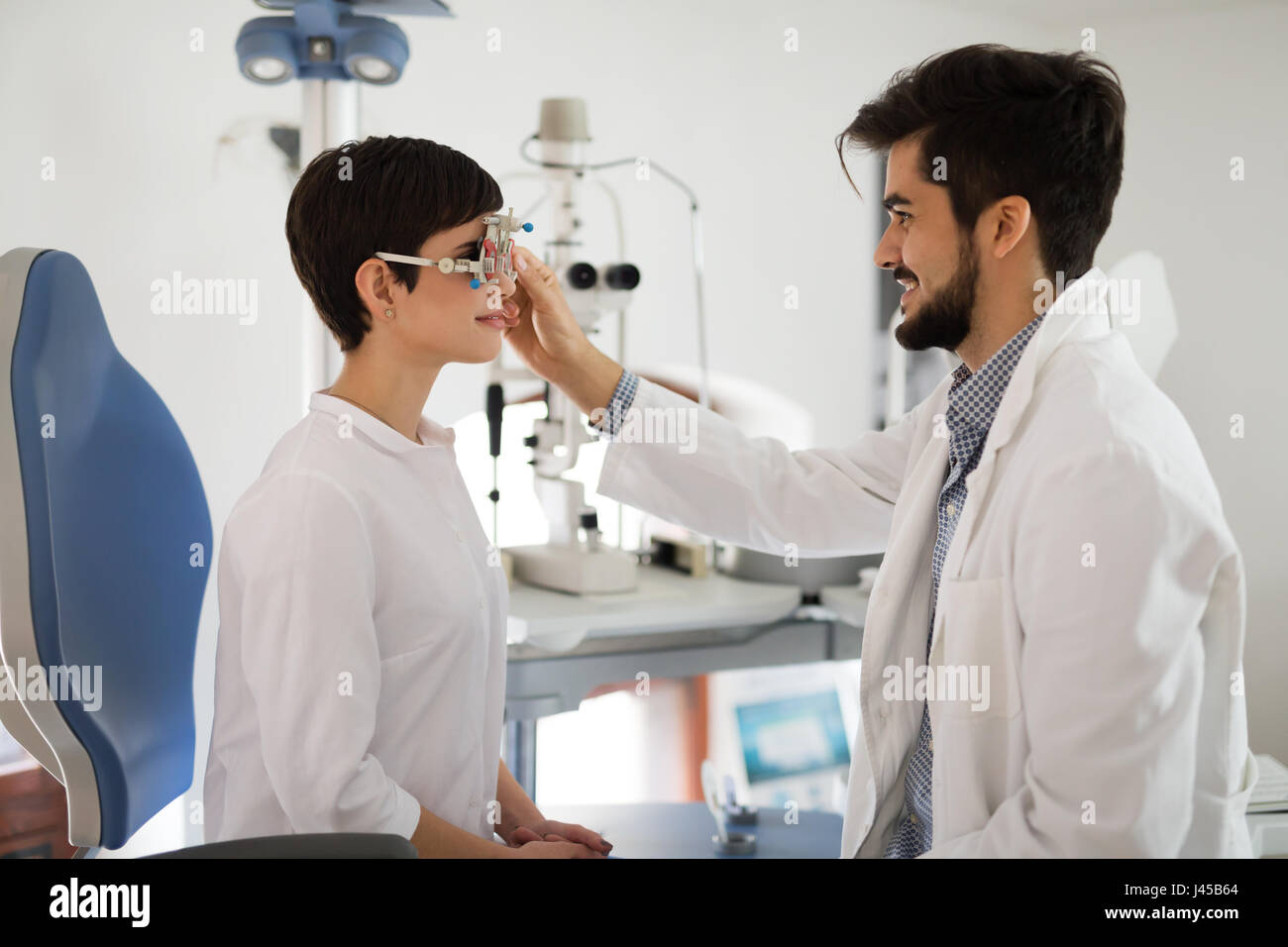 Female patient in ophthalmology clinic for diopter detection Stock ...