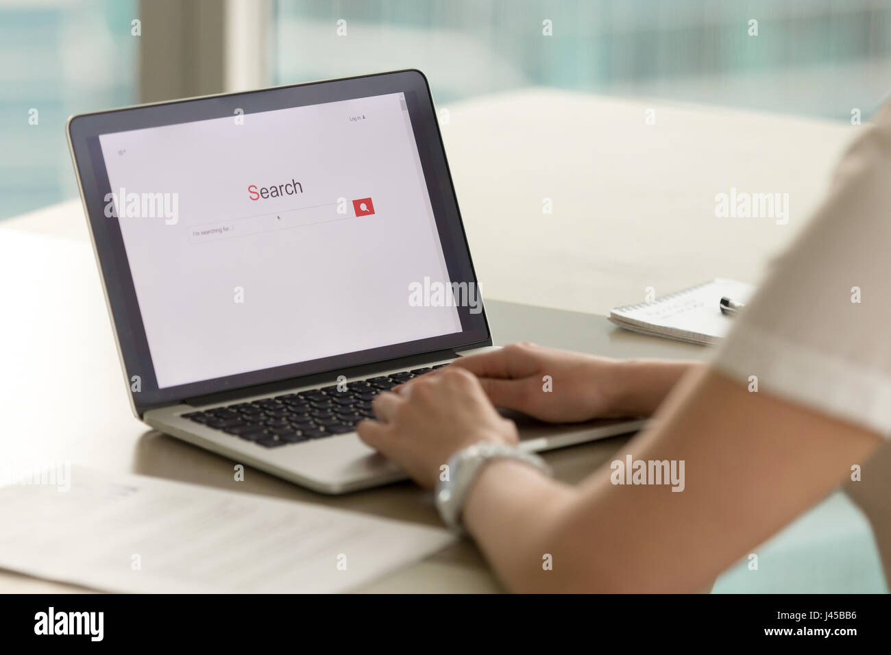 Woman searching information in Internet concept Stock Photo - Alamy