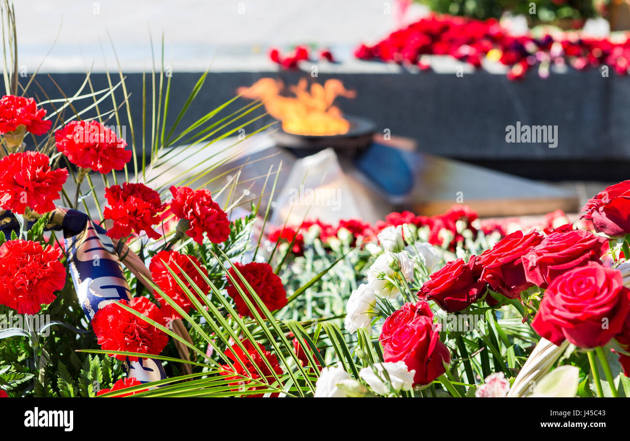 Eternal flame and flowers in memory of the Victory in the Great ...