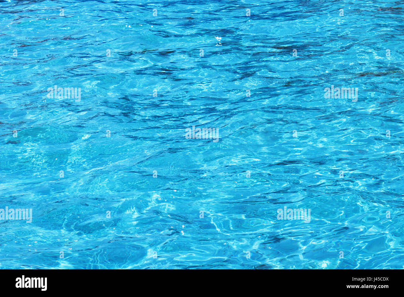Close-up photo of blue clean water waves and shiny reflections Stock ...