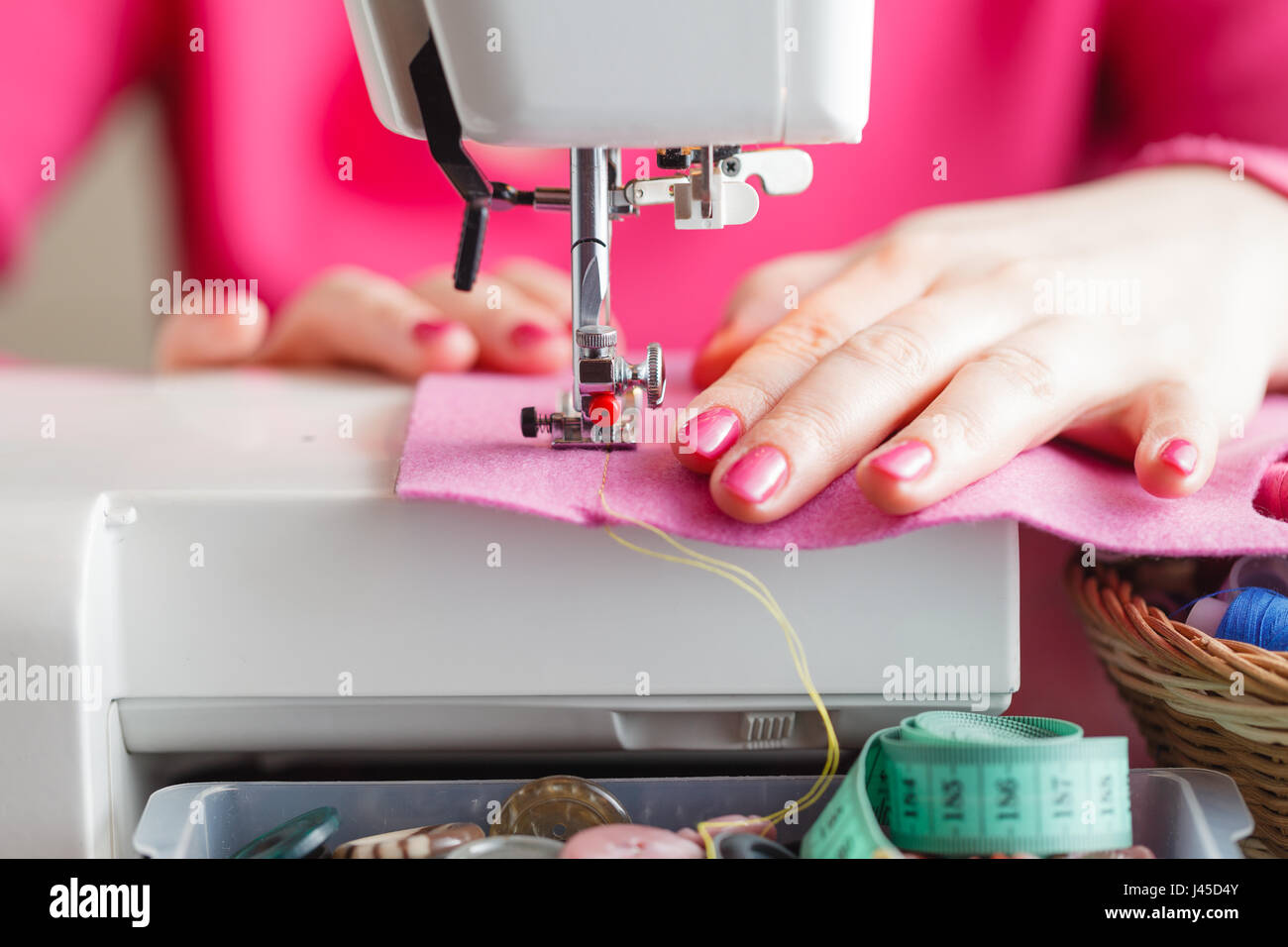 Tailor working on a sewing machine Stock Photo - Alamy