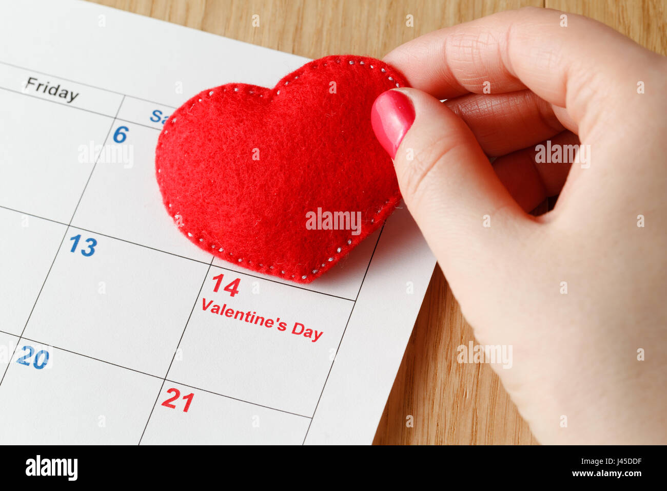 Red heart and calendar, love month Stock Photo - Alamy