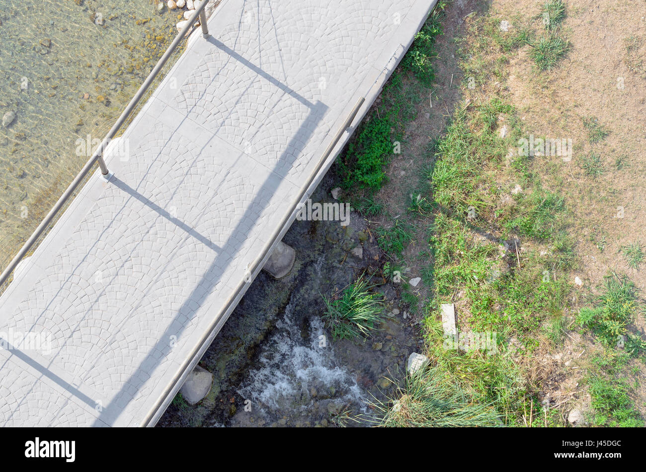 Aerial view of bridge over Mijares river. Swimming area of thermal ...
