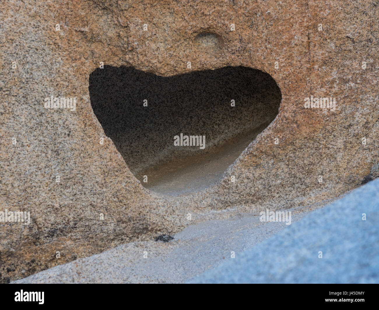 Heart Shaped Cubby in Sand Stone Stock Photo - Alamy