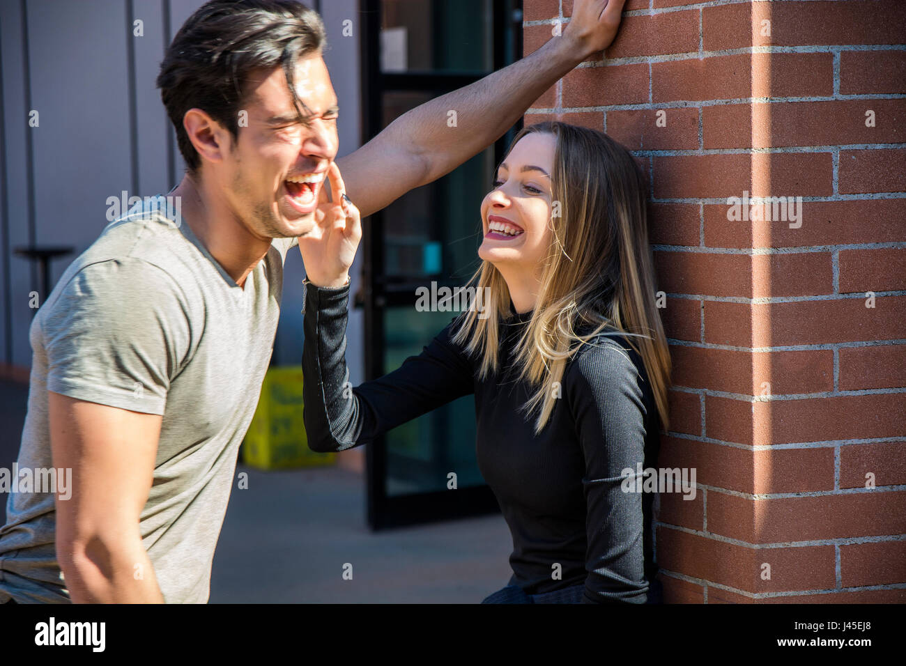 Attractive romantic couple, laughing Stock Photo - Alamy