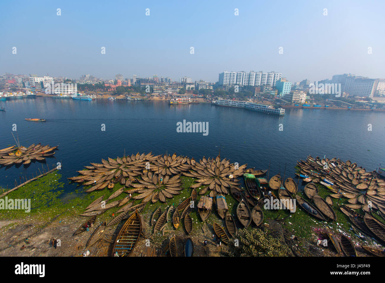 Boats are harboured on the Buriganga River at Sadarghat. Dhaka ...