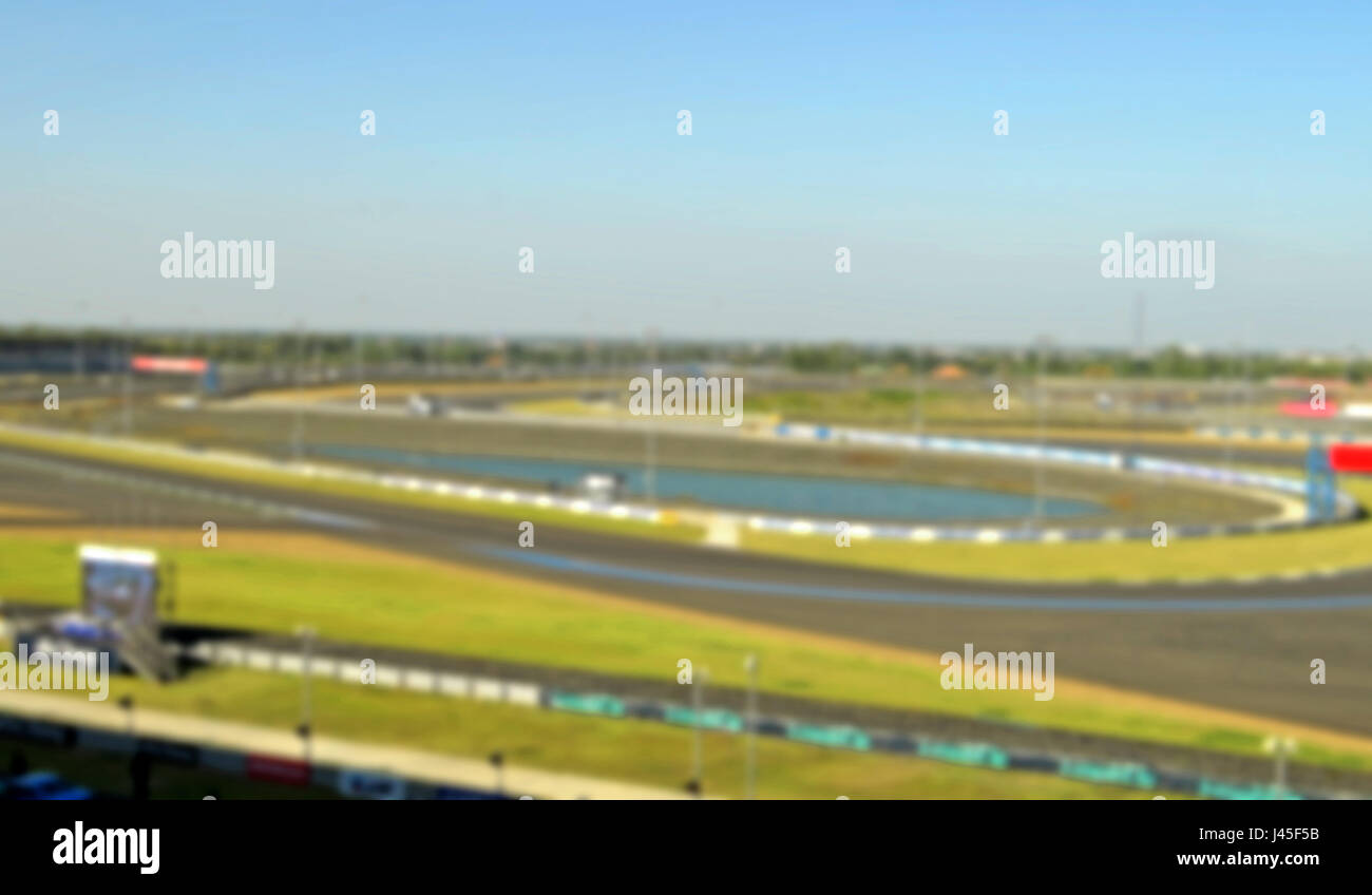 blurry picture car racing track as sport background Stock Photo - Alamy