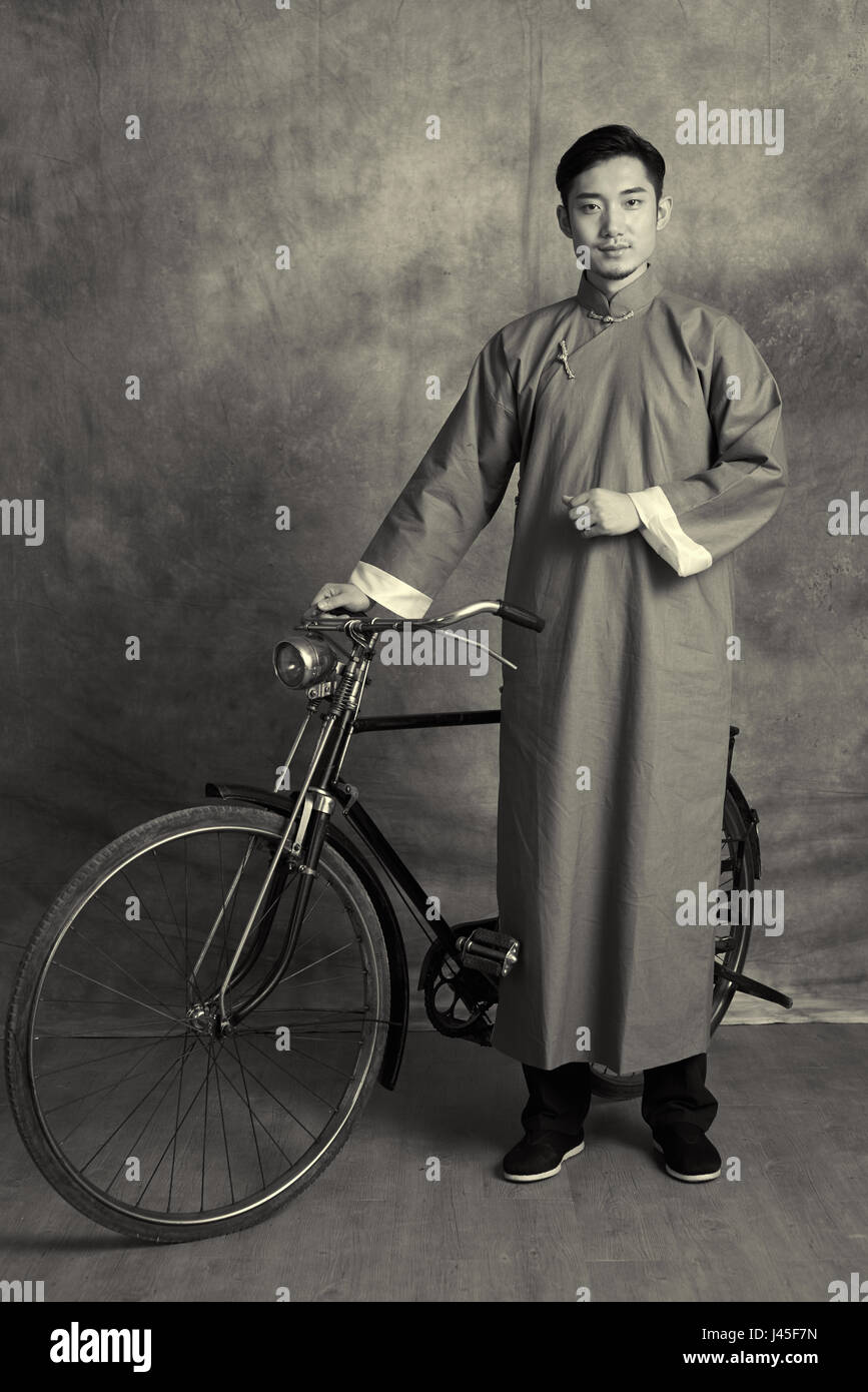 Indian man pushing bike hi-res stock photography and images - Alamy