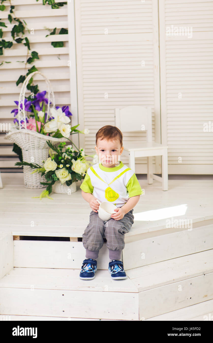 Child cup sad hi-res stock photography and images - Alamy