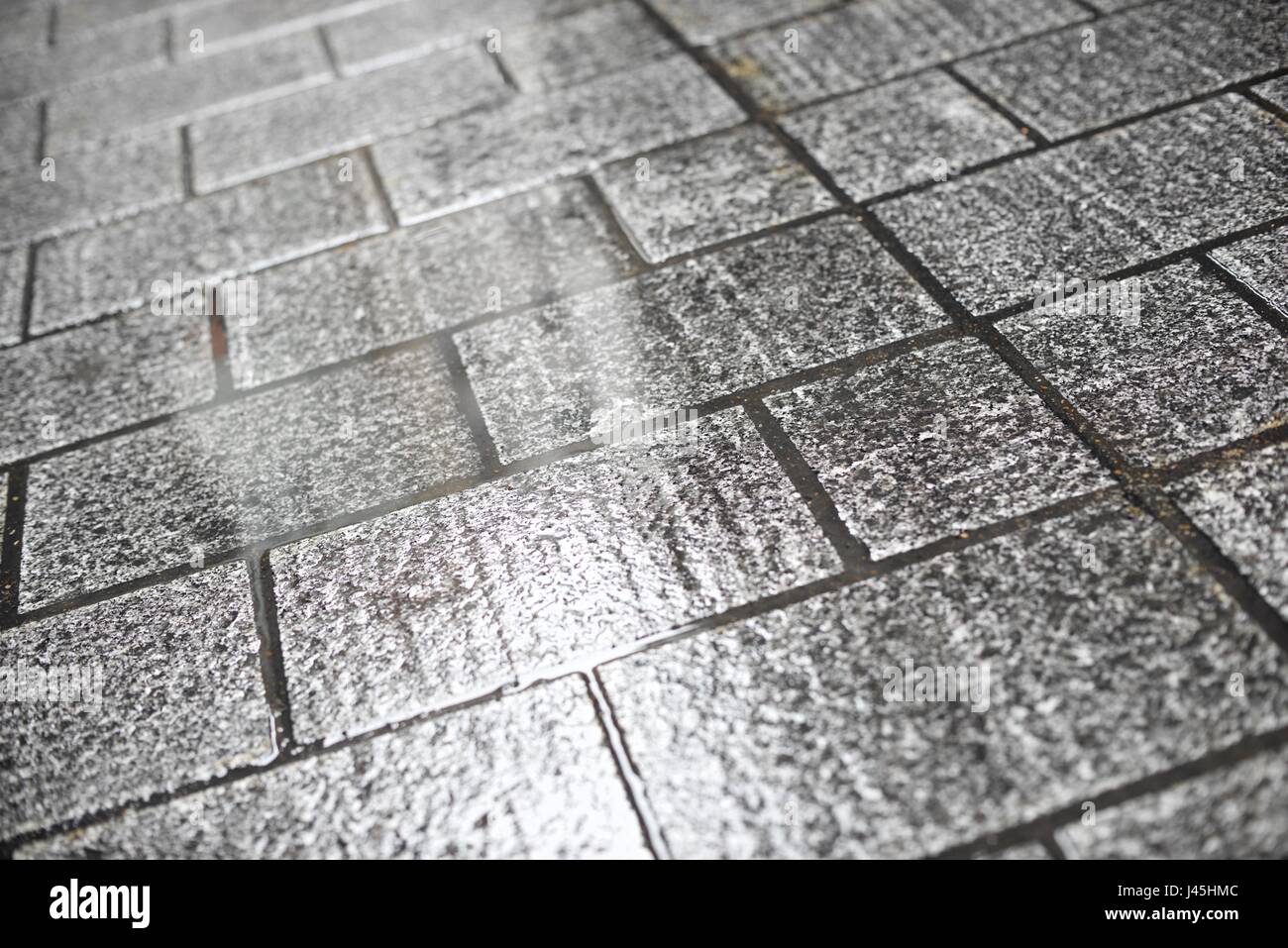Floor of a street with stone tiles Stock Photo - Alamy