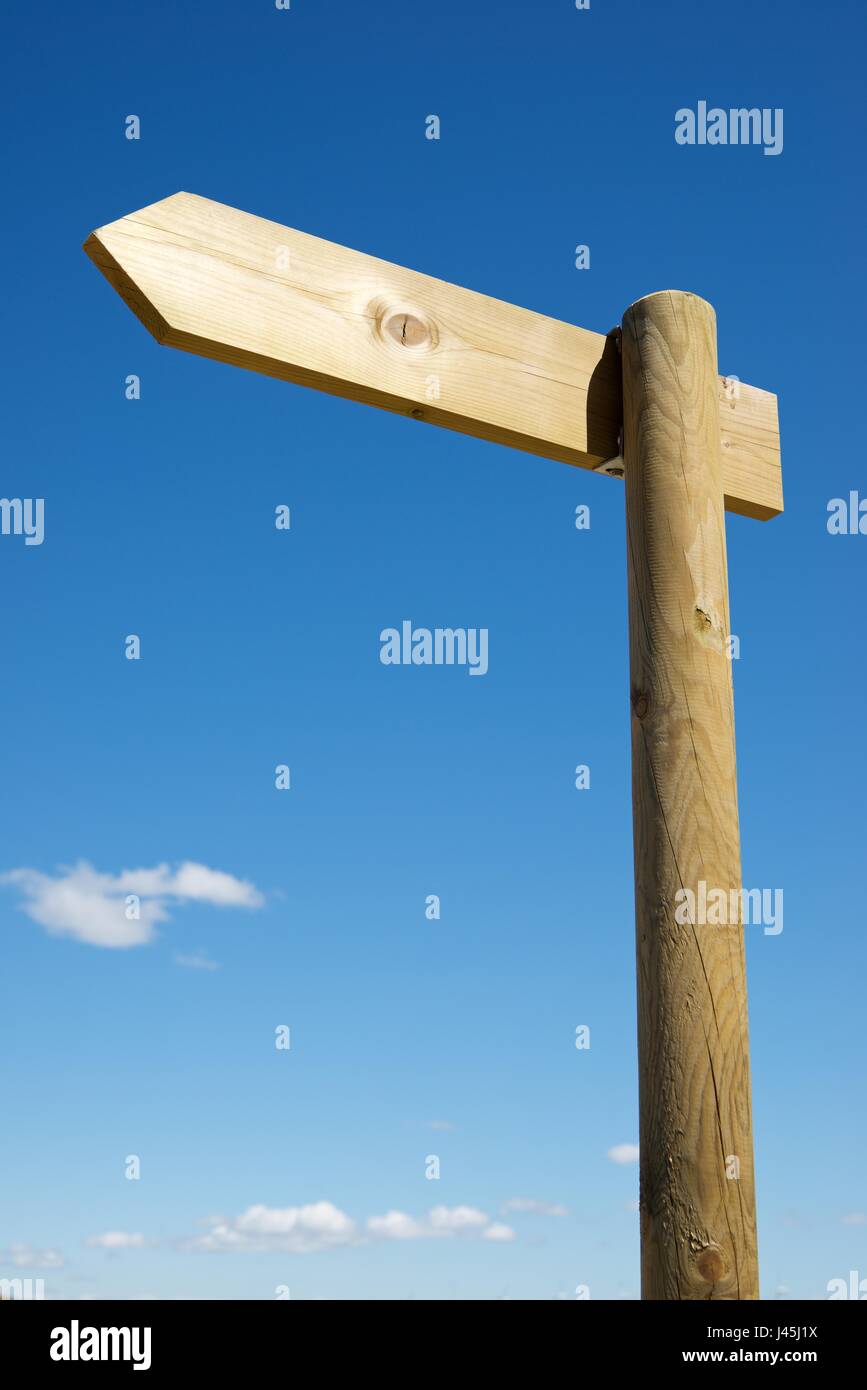 View of a directional wood signal Stock Photo - Alamy