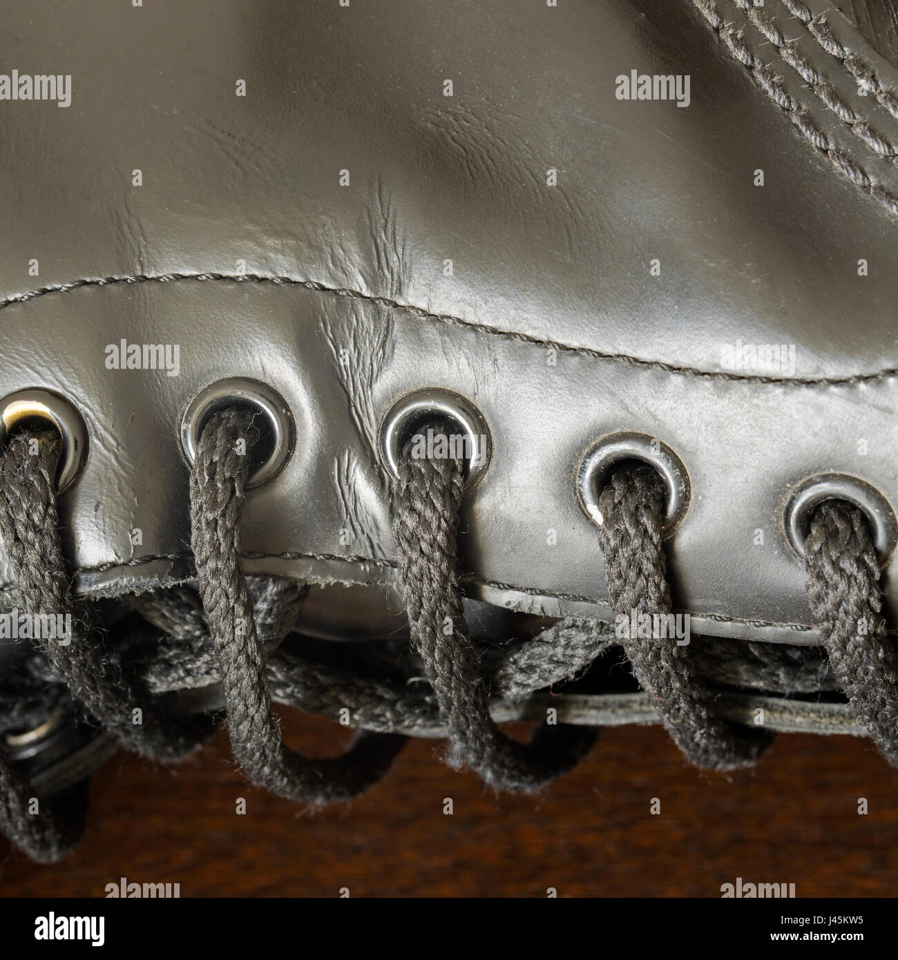 Black leather boot with laces Stock Photo - Alamy