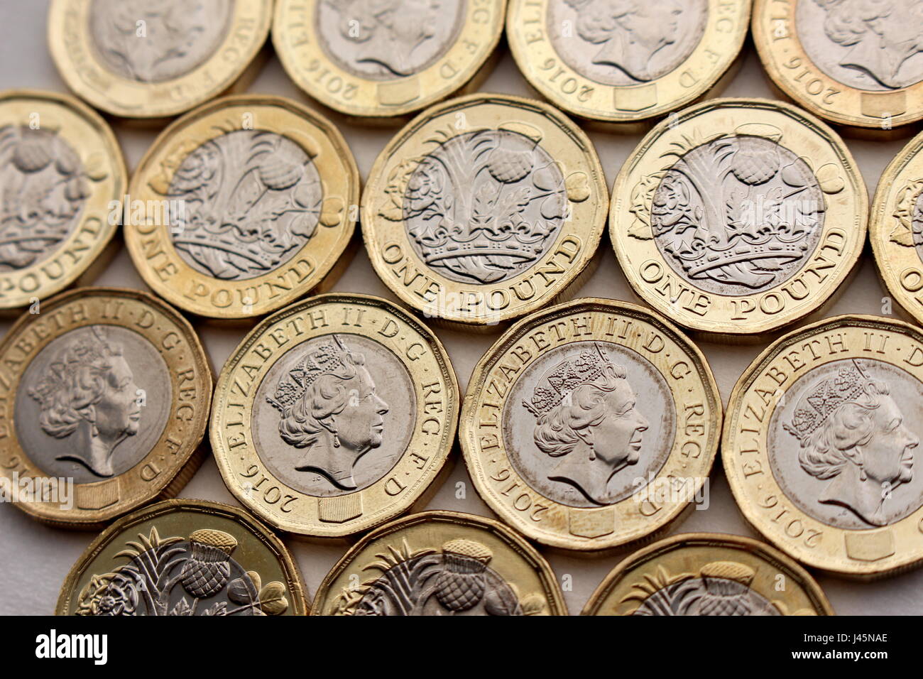 A neat pattern of new British sterling 12-sided pound coins Stock Photo ...
