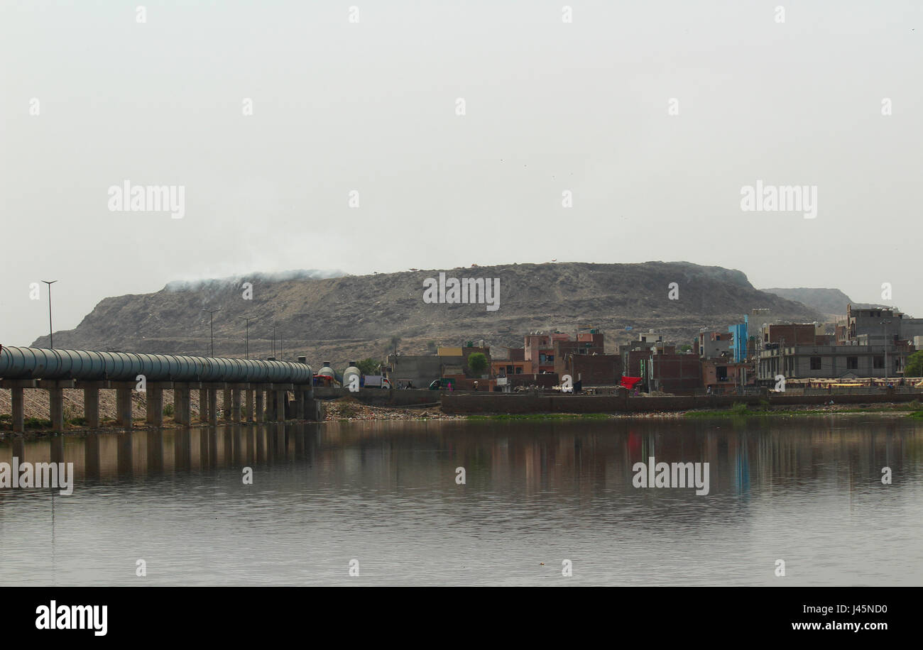 Bhalswa landfill site behind Bhalswa lake in Northwest Delhi, India ...