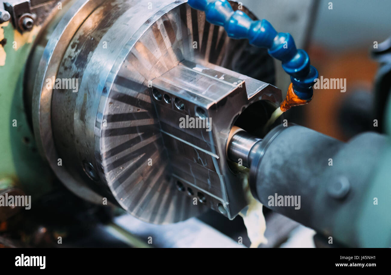 Tired overworked worker falls asleep during working hours in factory ...