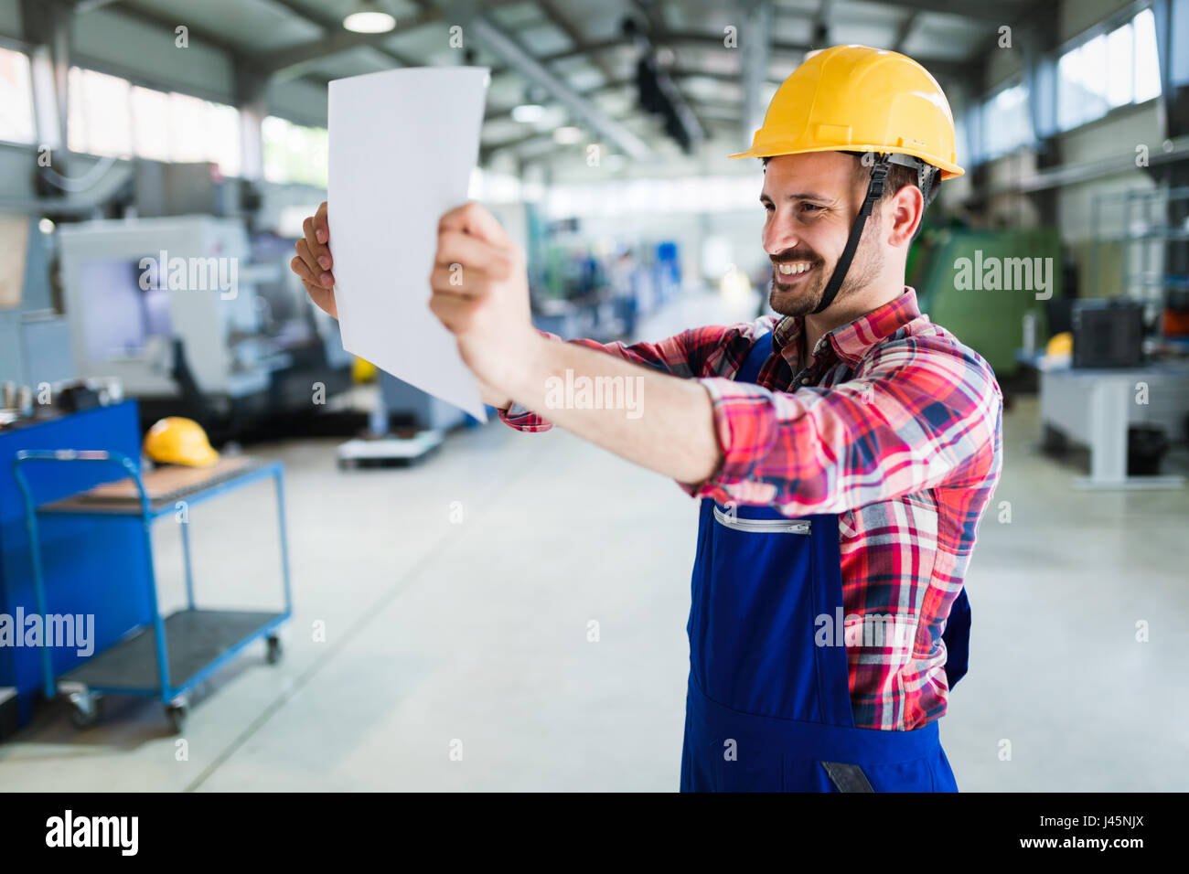 industrial factory worker working in metal manufacturing industry Stock ...
