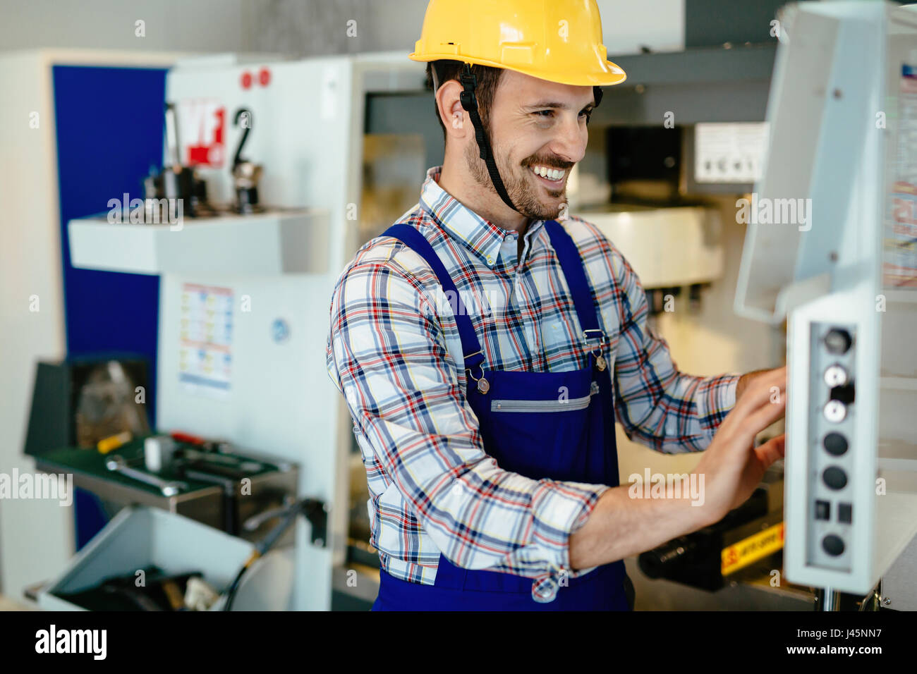 industrial factory worker working in metal manufacturing industry Stock ...