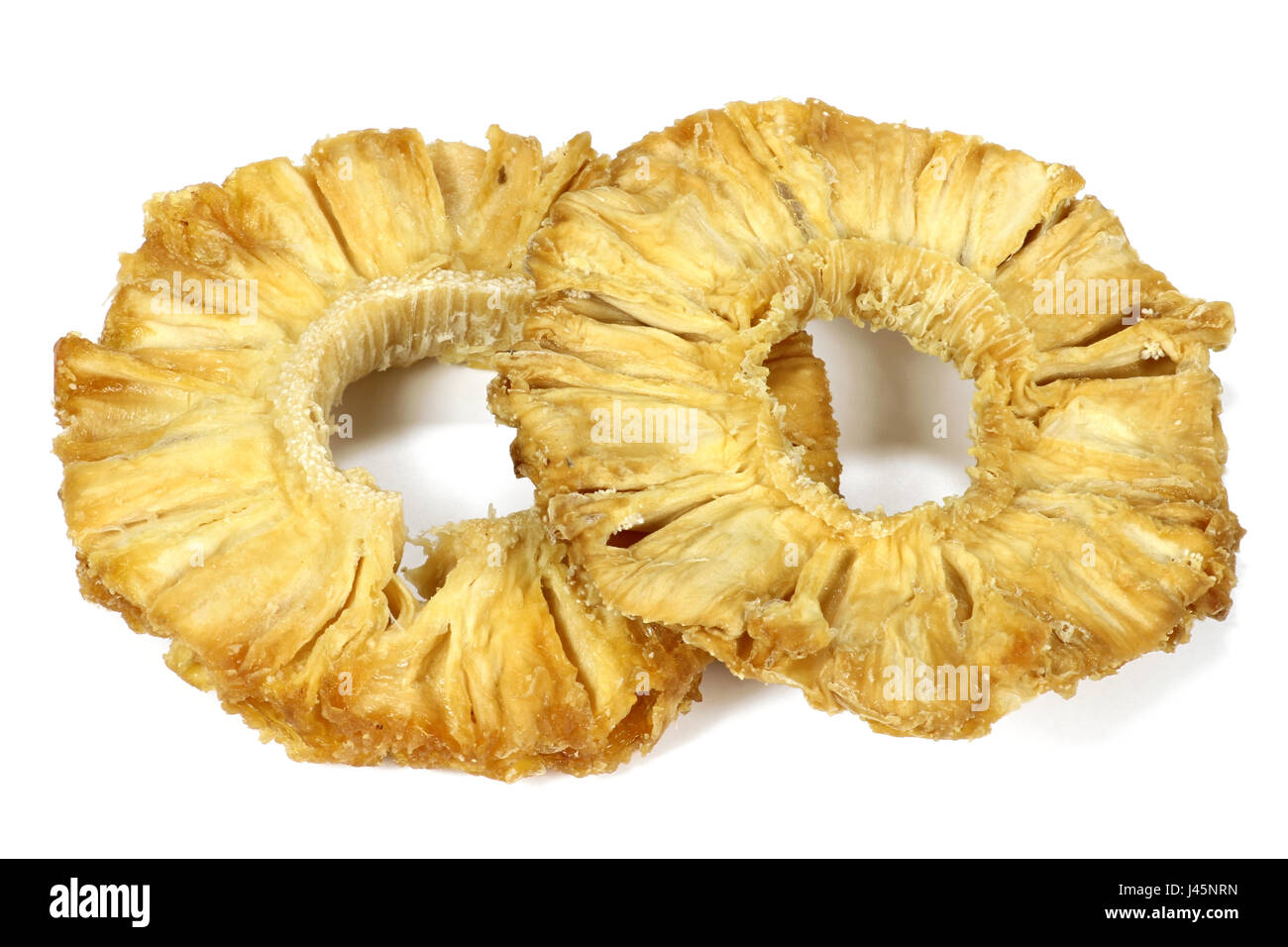 dried pineapple rings isolated on white background Stock Photo - Alamy