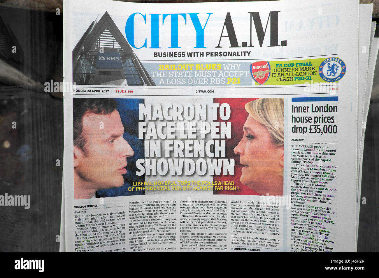 Emmanuel Macron and Marine LePen on the front page of CITY A.M ...
