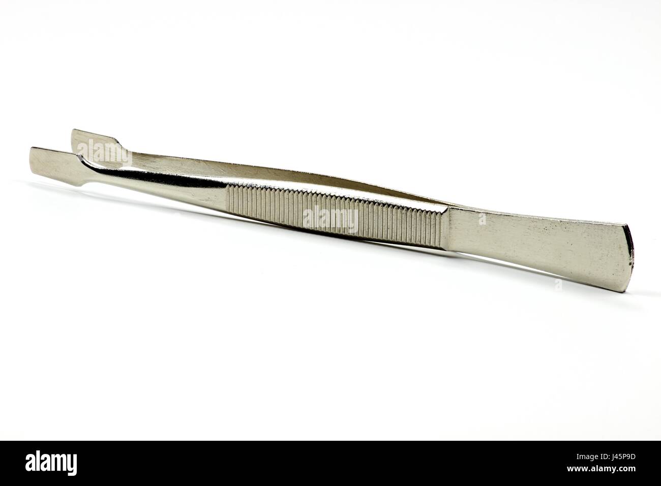 stamp tweezers isolated on white background Stock Photo - Alamy