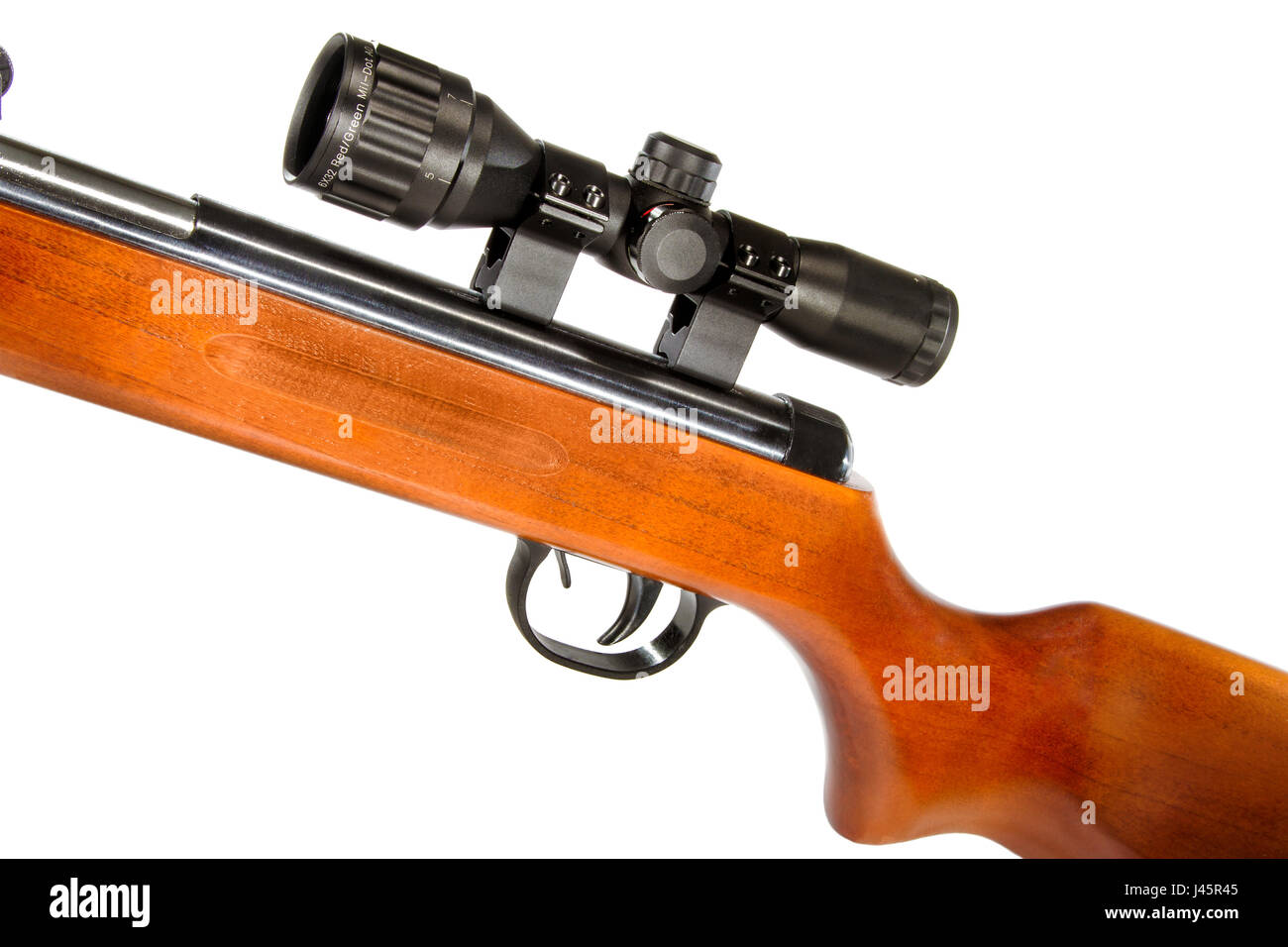 a air rifle with a telescopic sight and a wooden butt Stock Photo - Alamy