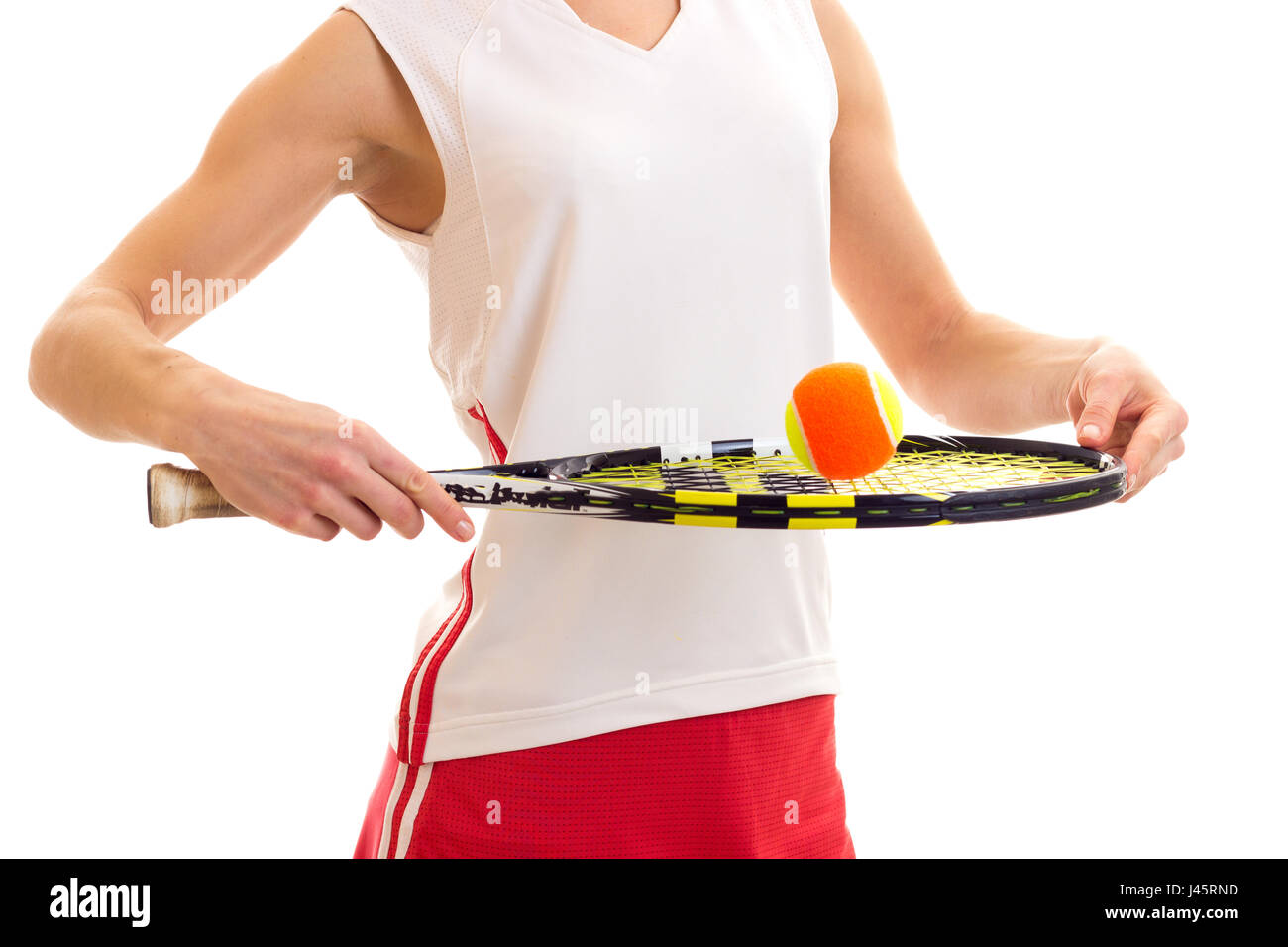 Woman with tennis racquet and ball Stock Photo - Alamy