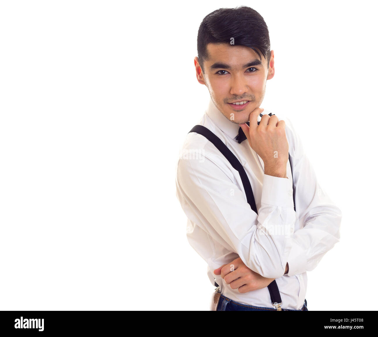 Young man with bow-tie and suspenders Stock Photo - Alamy