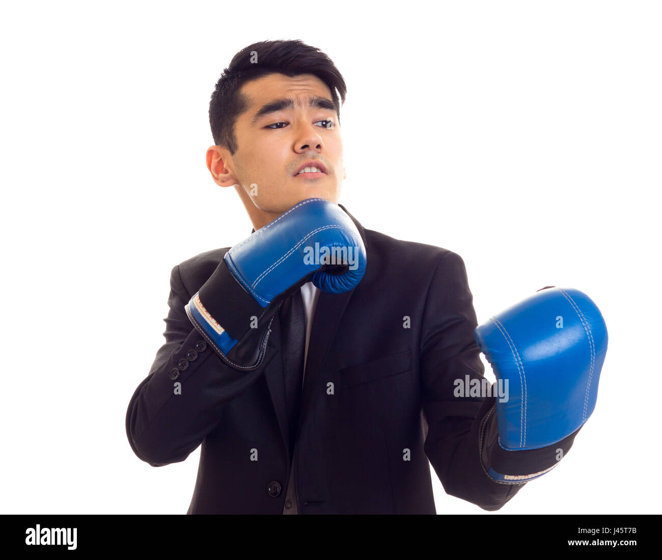 Young man in suit with boxing gloves Stock Photo - Alamy
