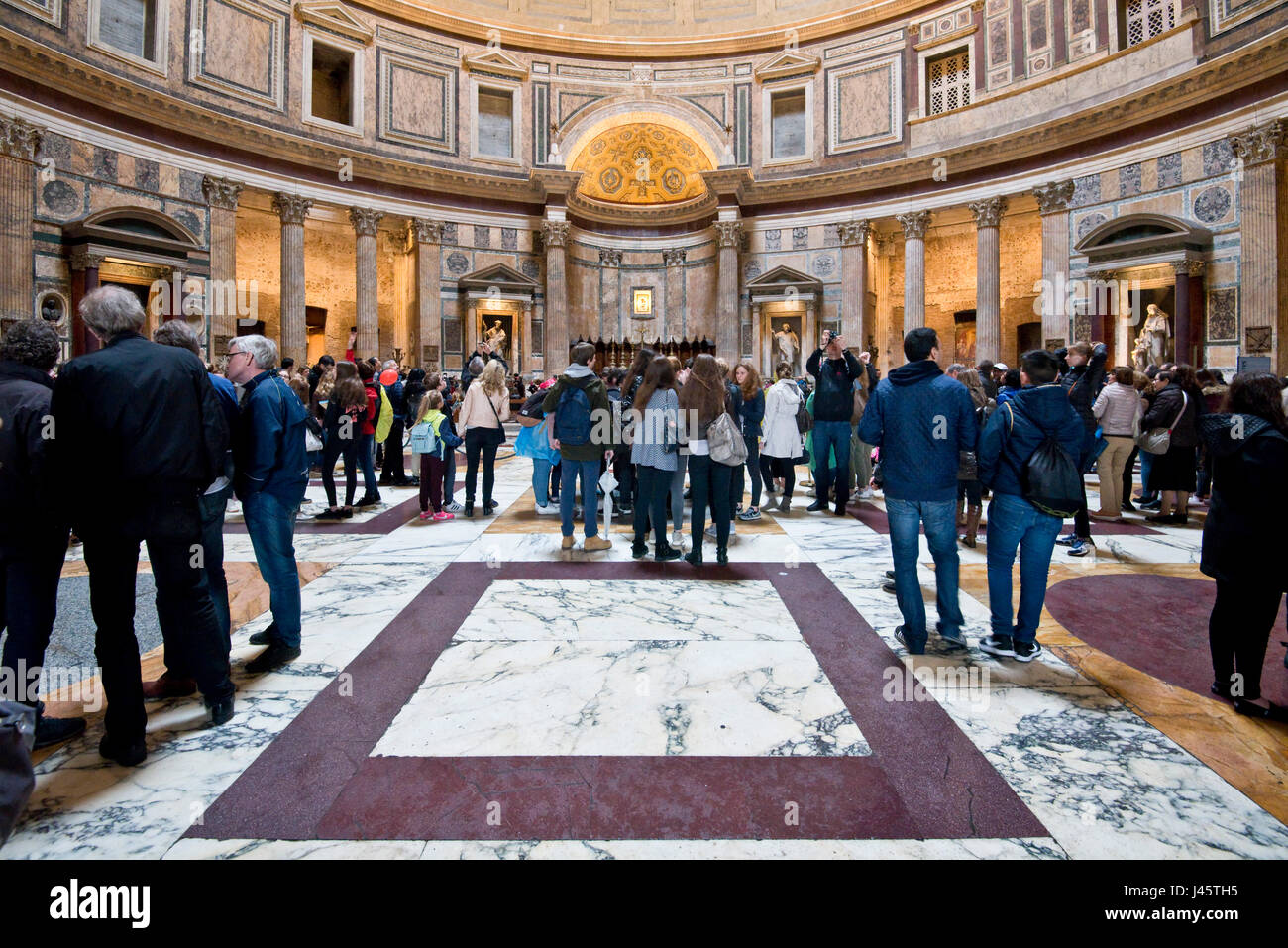 An interior view of tourists visitors visiting inside the Pantheon in ...