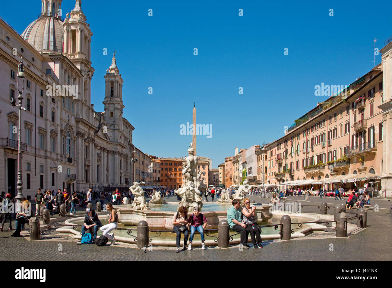 Fontana del Moro or Moor Fountain in Piazza Navona (Rome) with tourists ...