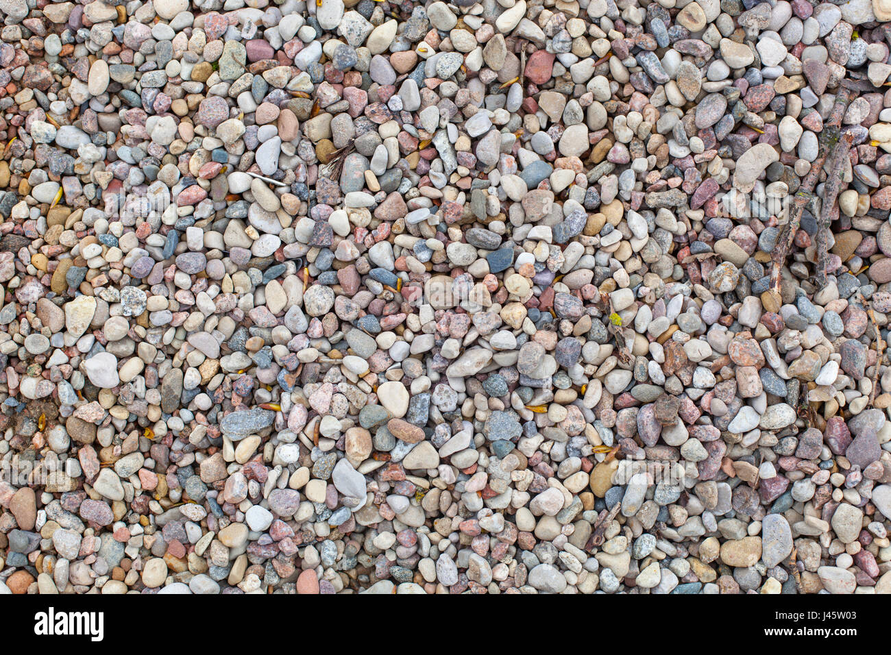 Colored building pebbles Stock Photo - Alamy
