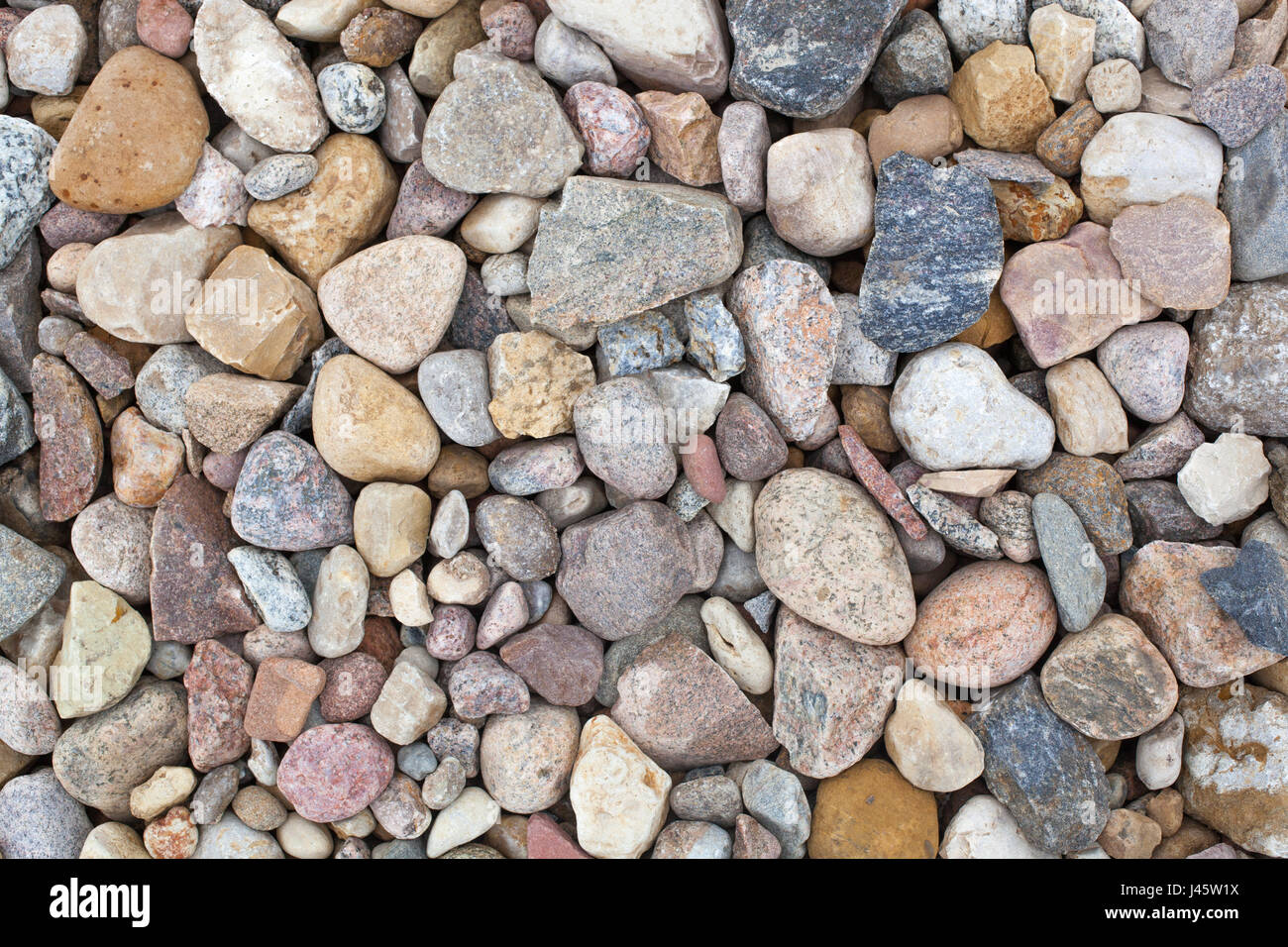 Colored construction pebbles Stock Photo - Alamy
