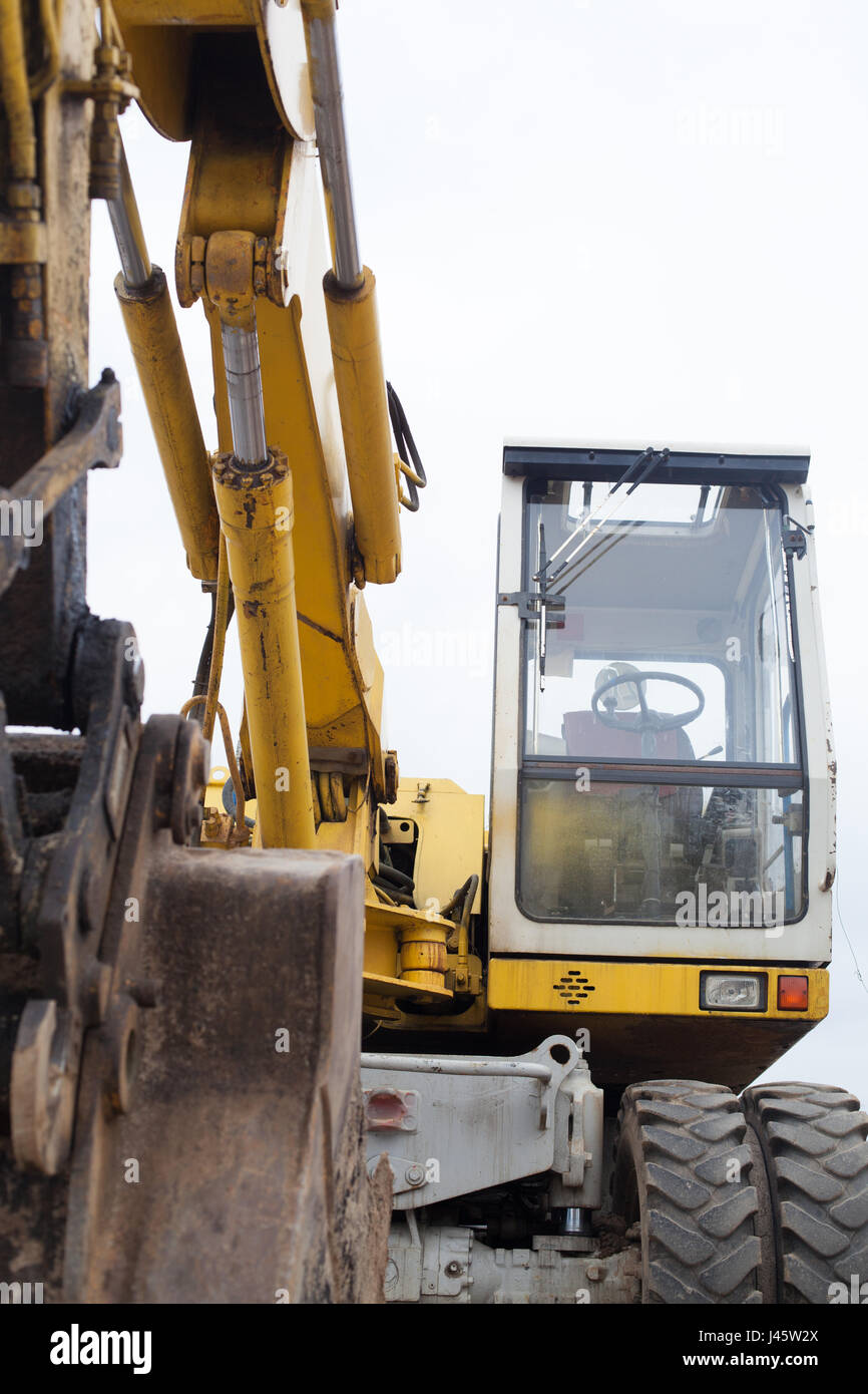 Construction excavator front view Stock Photo - Alamy
