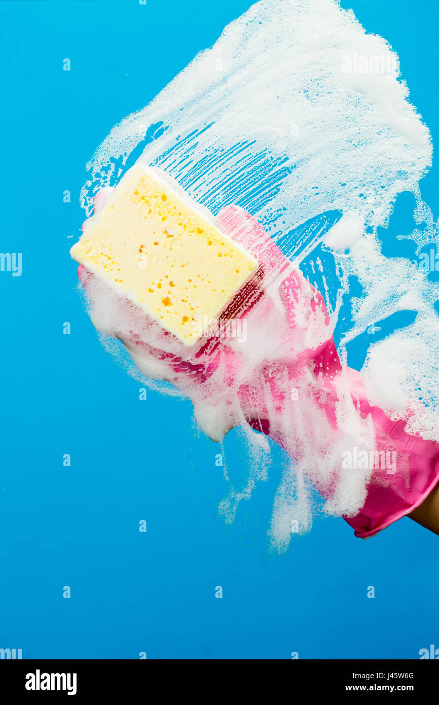 Washing window with soap and sponge Stock Photo - Alamy