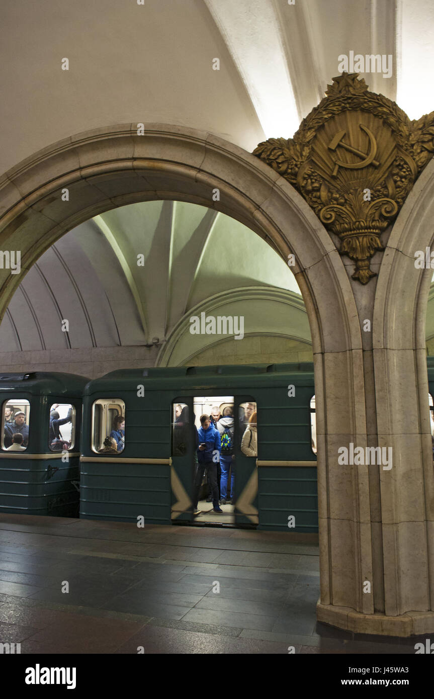Moscow: train and white marble pillar decorated with hammer and sickle ...