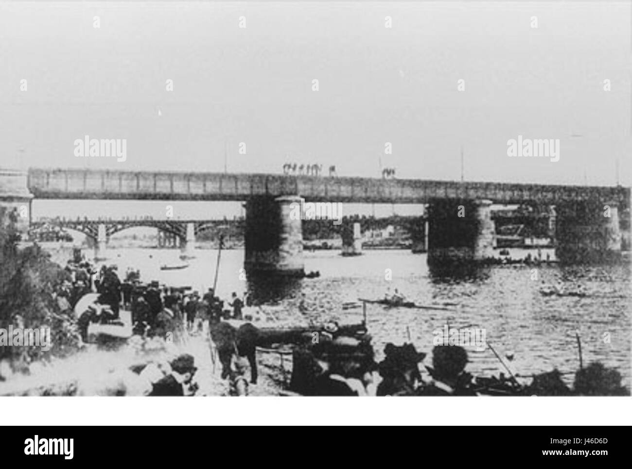This historical photograph captures Olympic rowing in the year 1900 ...