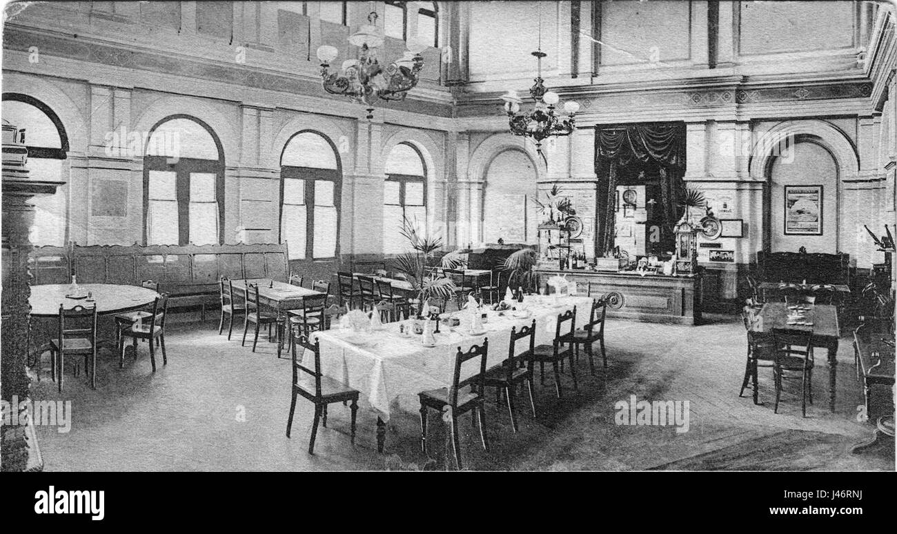 This image depicts a dining hall at a German train station, often ...